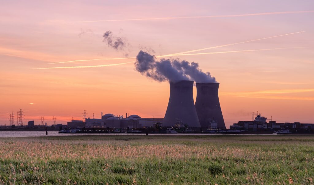Sunset over the nuclear reactor of Doel in the Port of Antwerp, Belgium ...